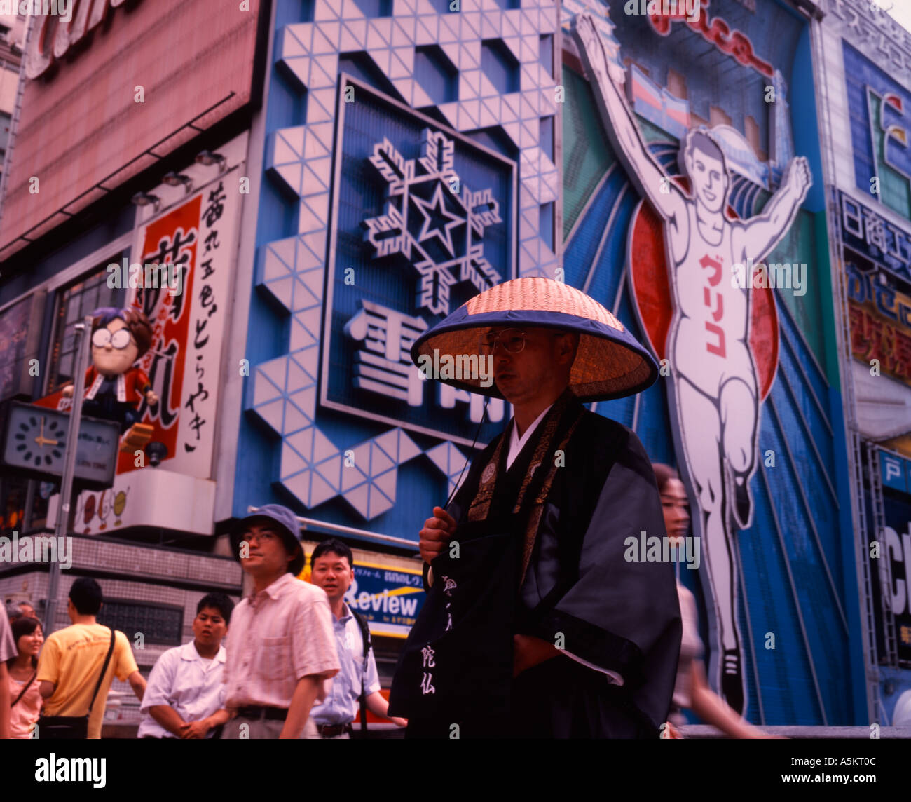 Shinto Monk on Dotonbori Bridge Osaka Japan Stock Photo - Alamy