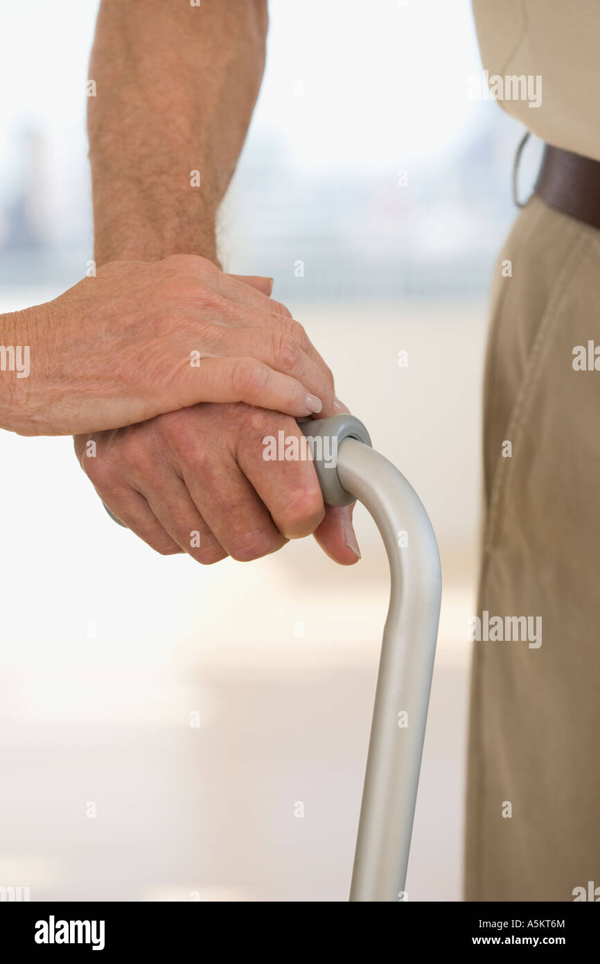 Hands on cane hi-res stock photography and images - Alamy