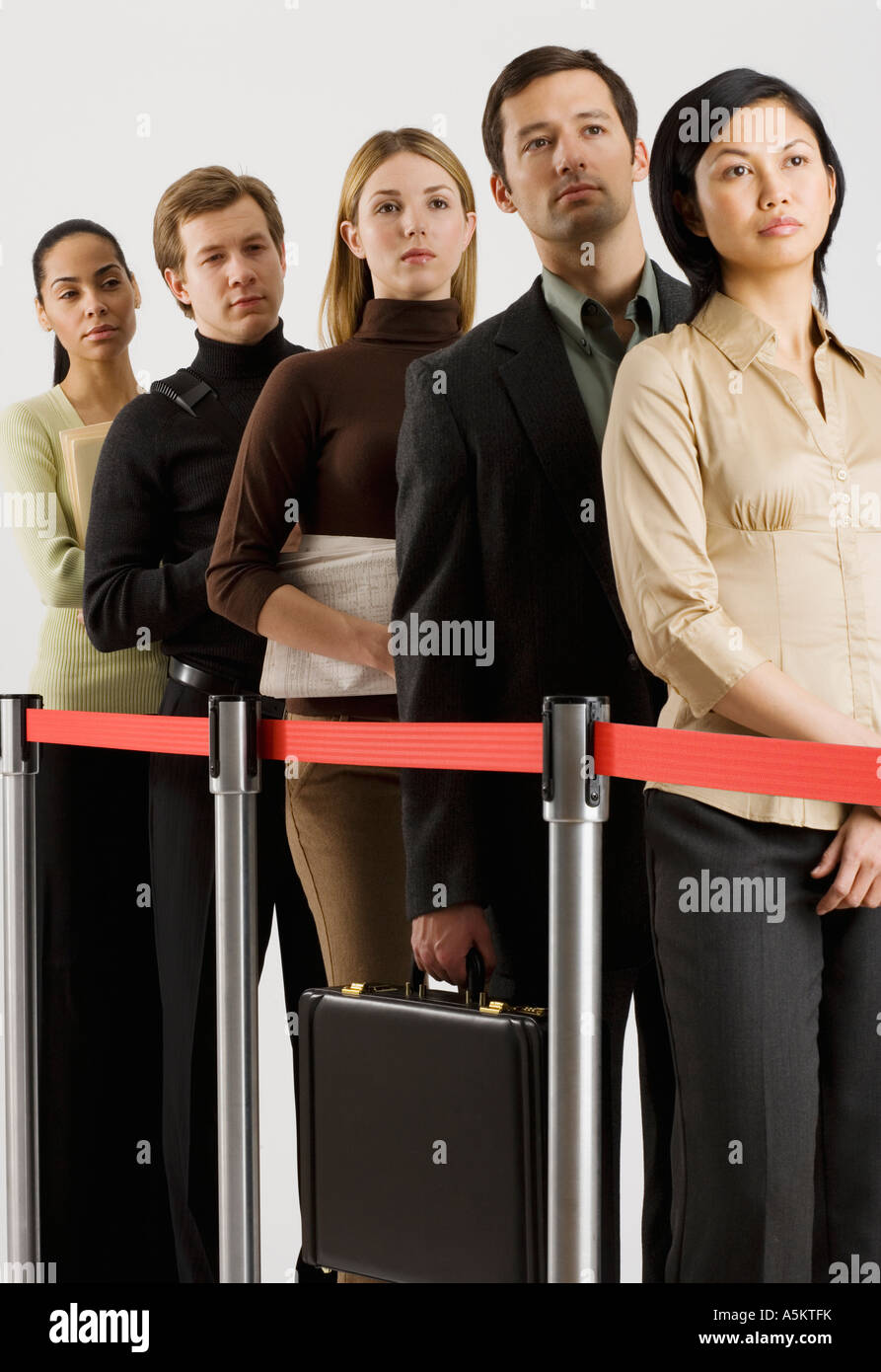 group of people standing in line Stock Photo - Alamy