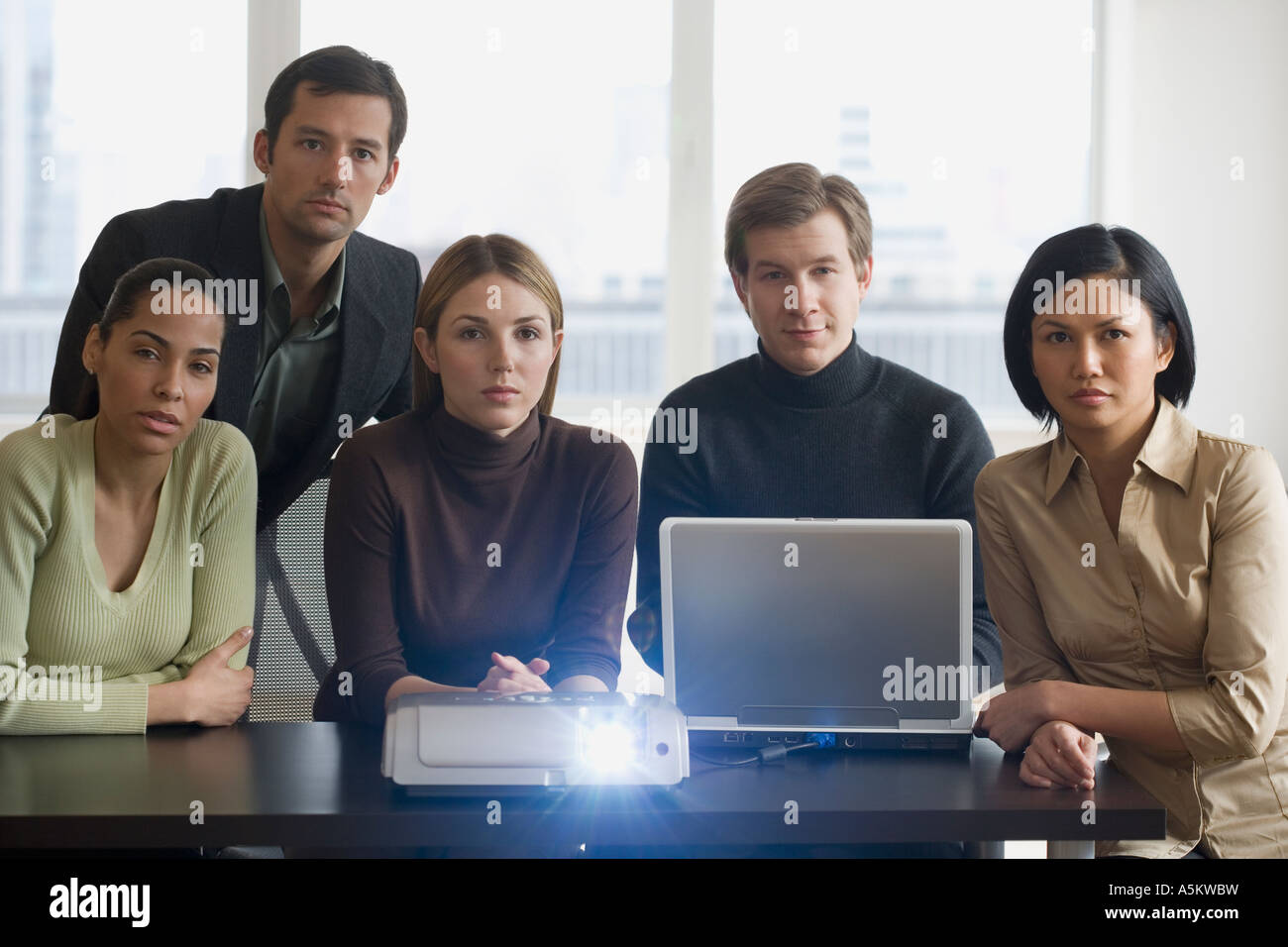 Businesswoman using projector hi-res stock photography and images - Alamy