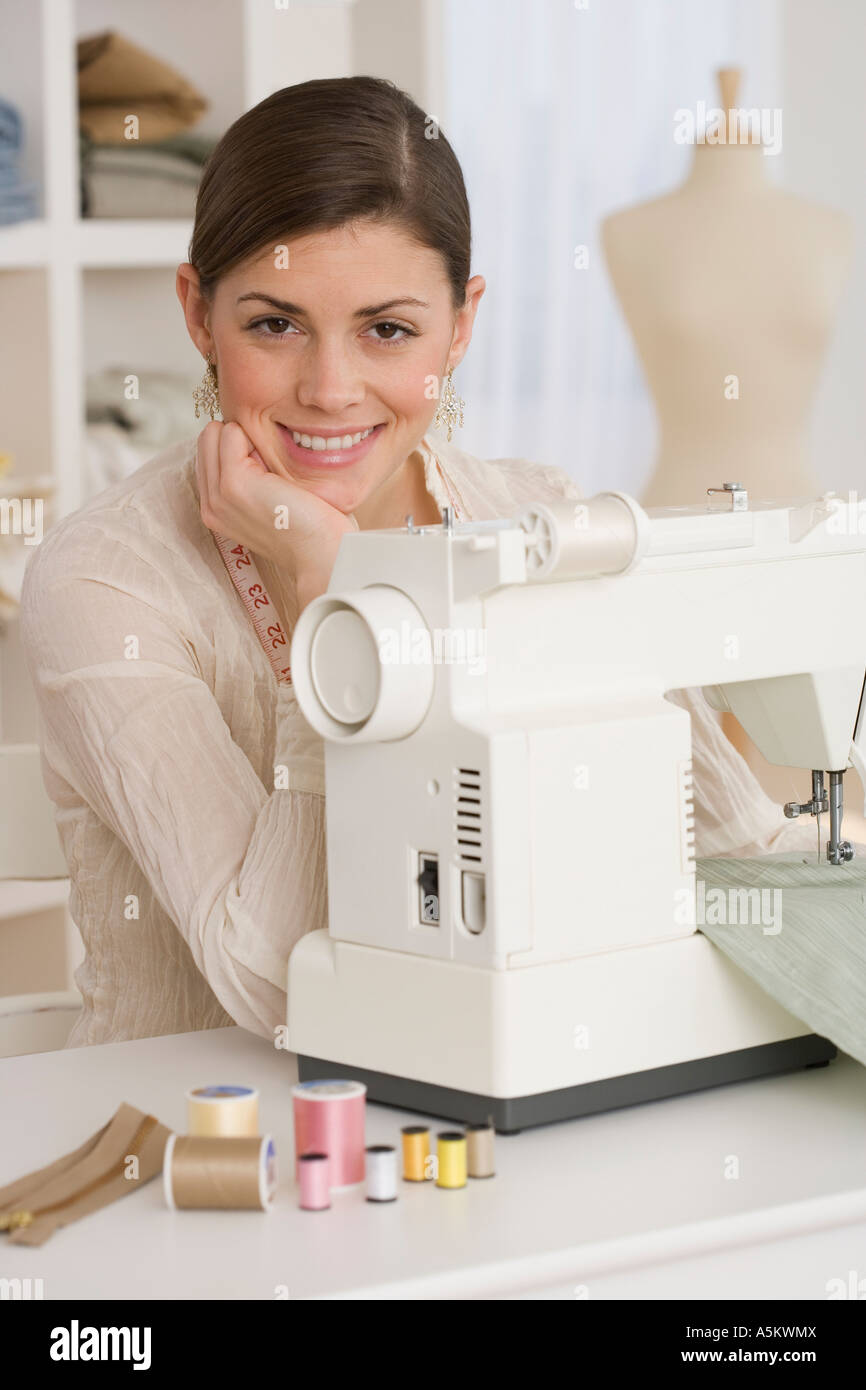 Woman with sewing machine hi-res stock photography and images - Alamy