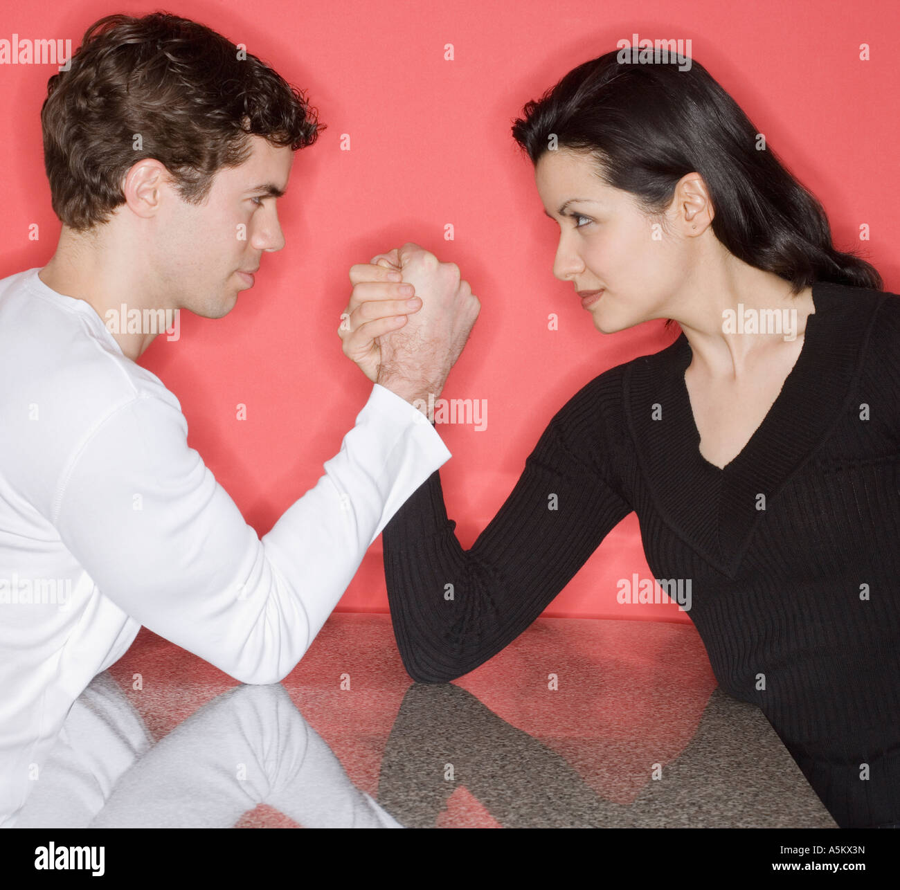Arm wrestling couple hi-res stock photography and images - Alamy