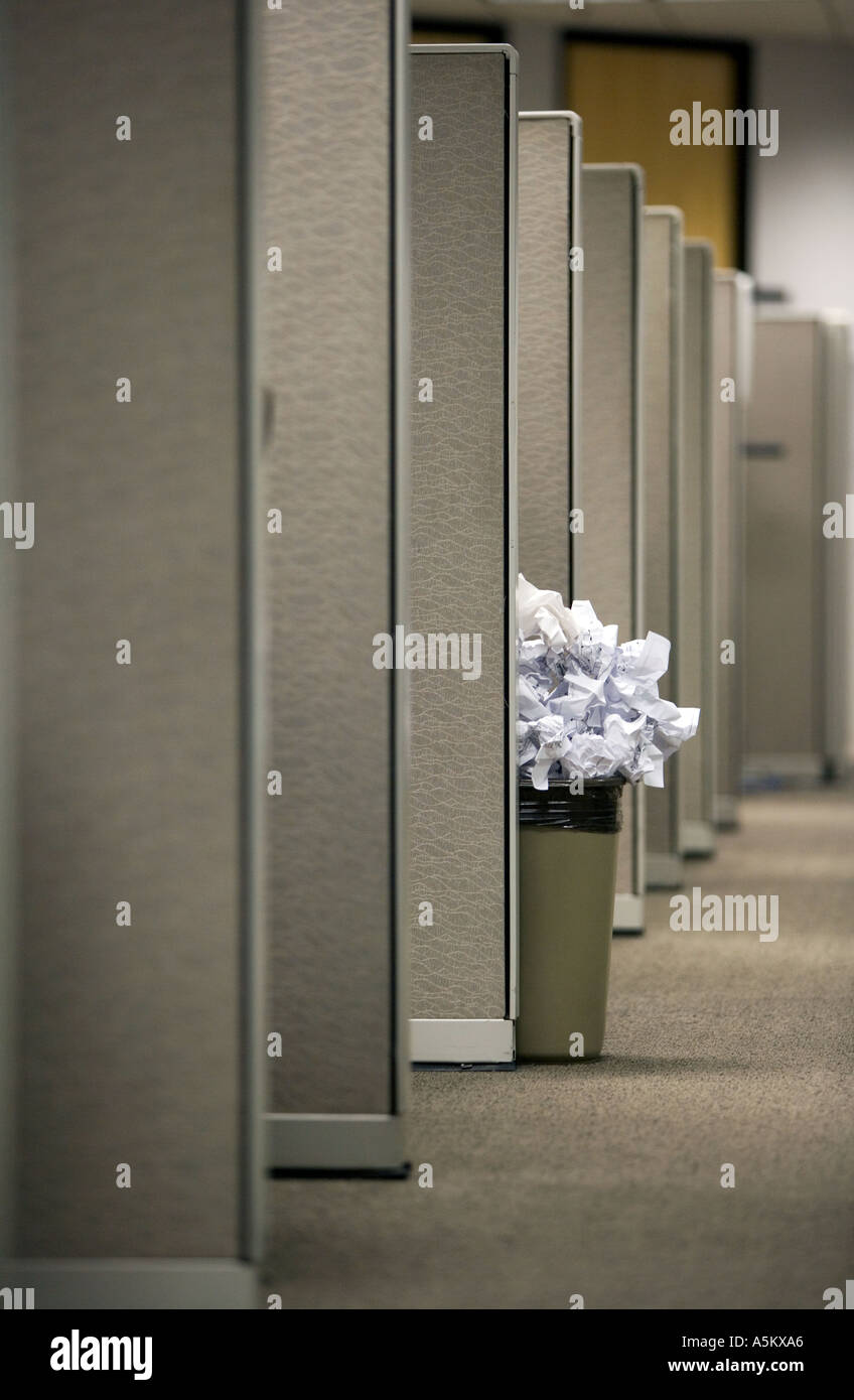 office cubicles with filled trash can Stock Photo - Alamy