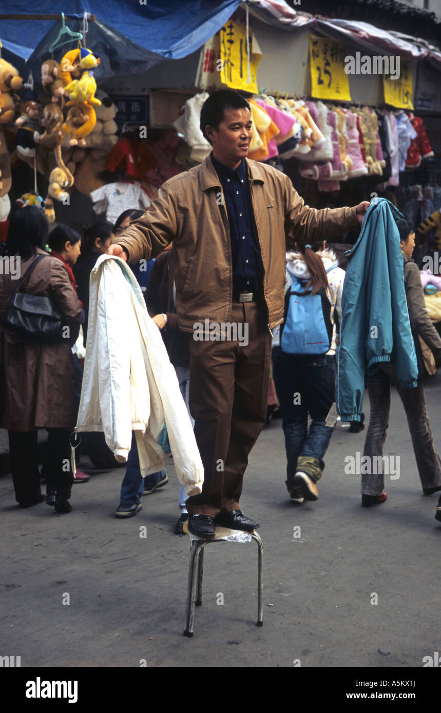 Chinese clothes vendor in market,Chengdu,Sichuan,China Stock Photo - Alamy