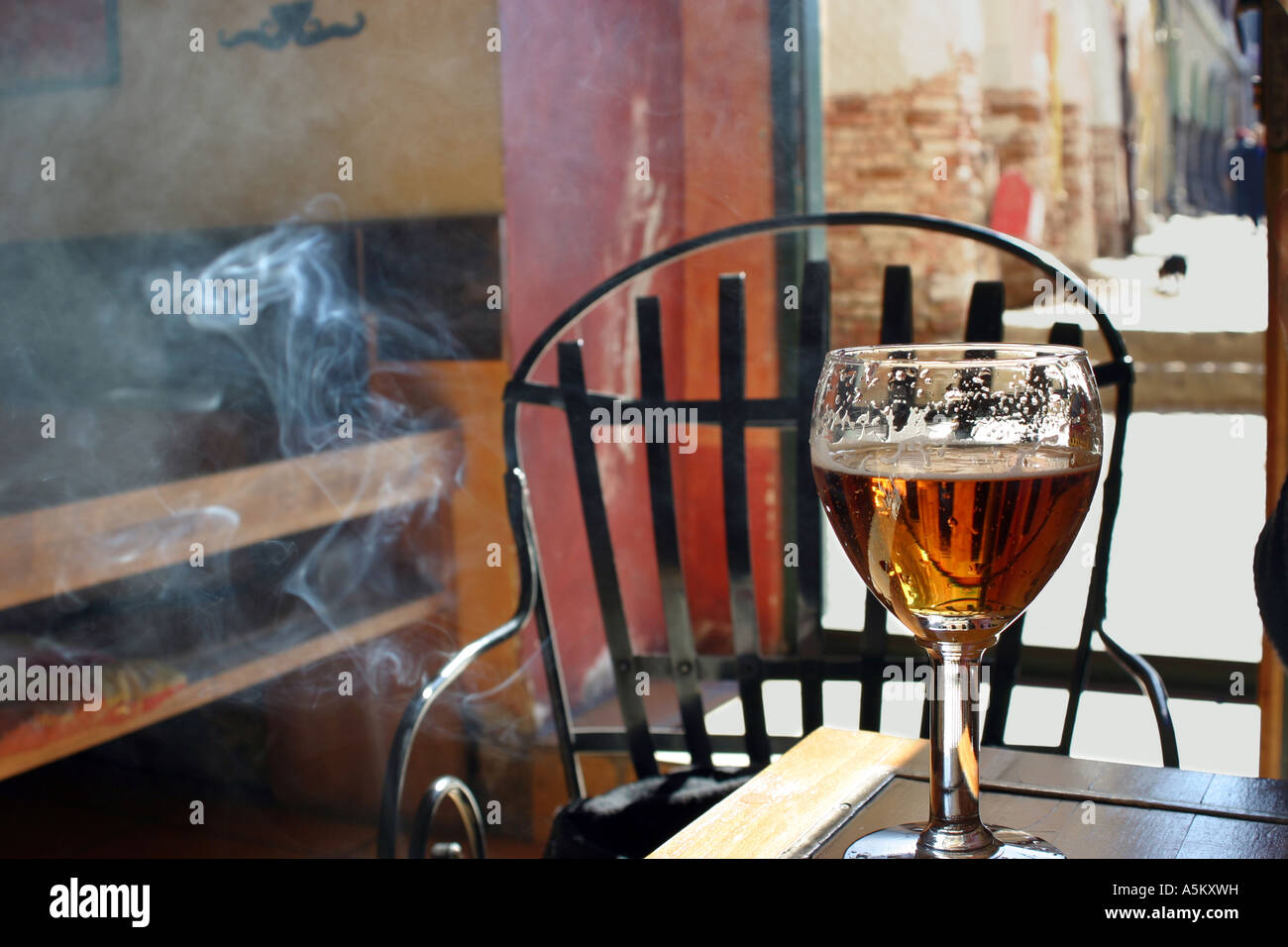 A beer and a cigarrete at a bar at Sibiu, Romania Stock Photo - Alamy