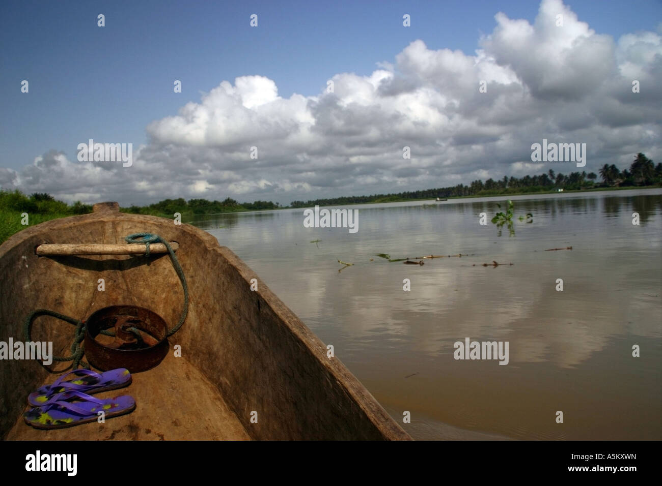 A canoe ride at a river in Africa Stock Photo - Alamy