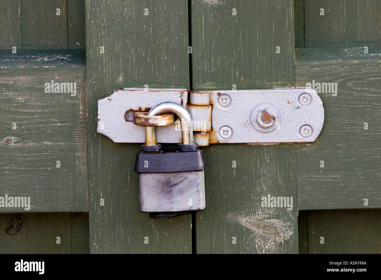padlock on gate Stock Photo - Alamy