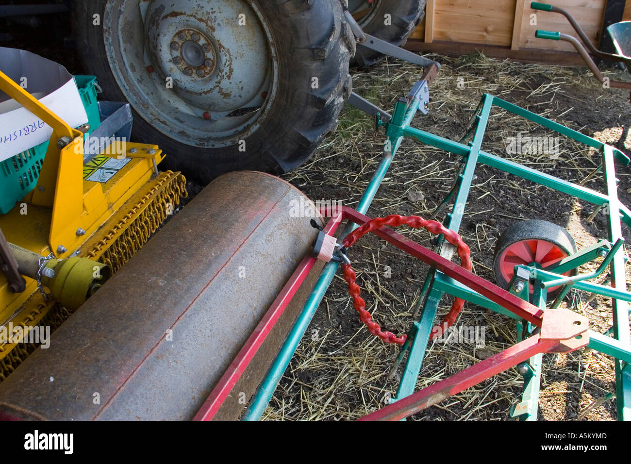 Padlock used to securer farm equipment Stock Photo - Alamy