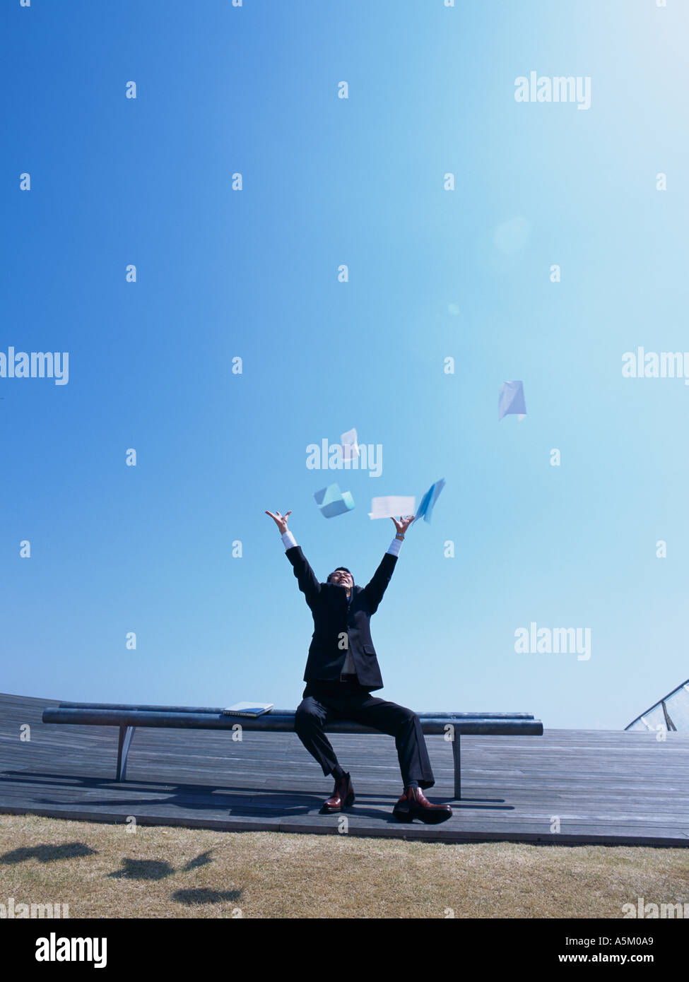 Throwing papers sky man hi-res stock photography and images - Alamy
