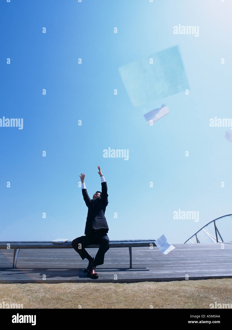 Throwing papers sky man hi-res stock photography and images - Alamy
