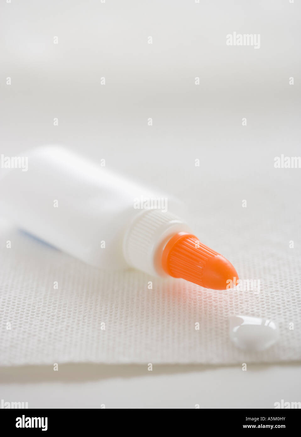 Close up of glue bottle Stock Photo - Alamy