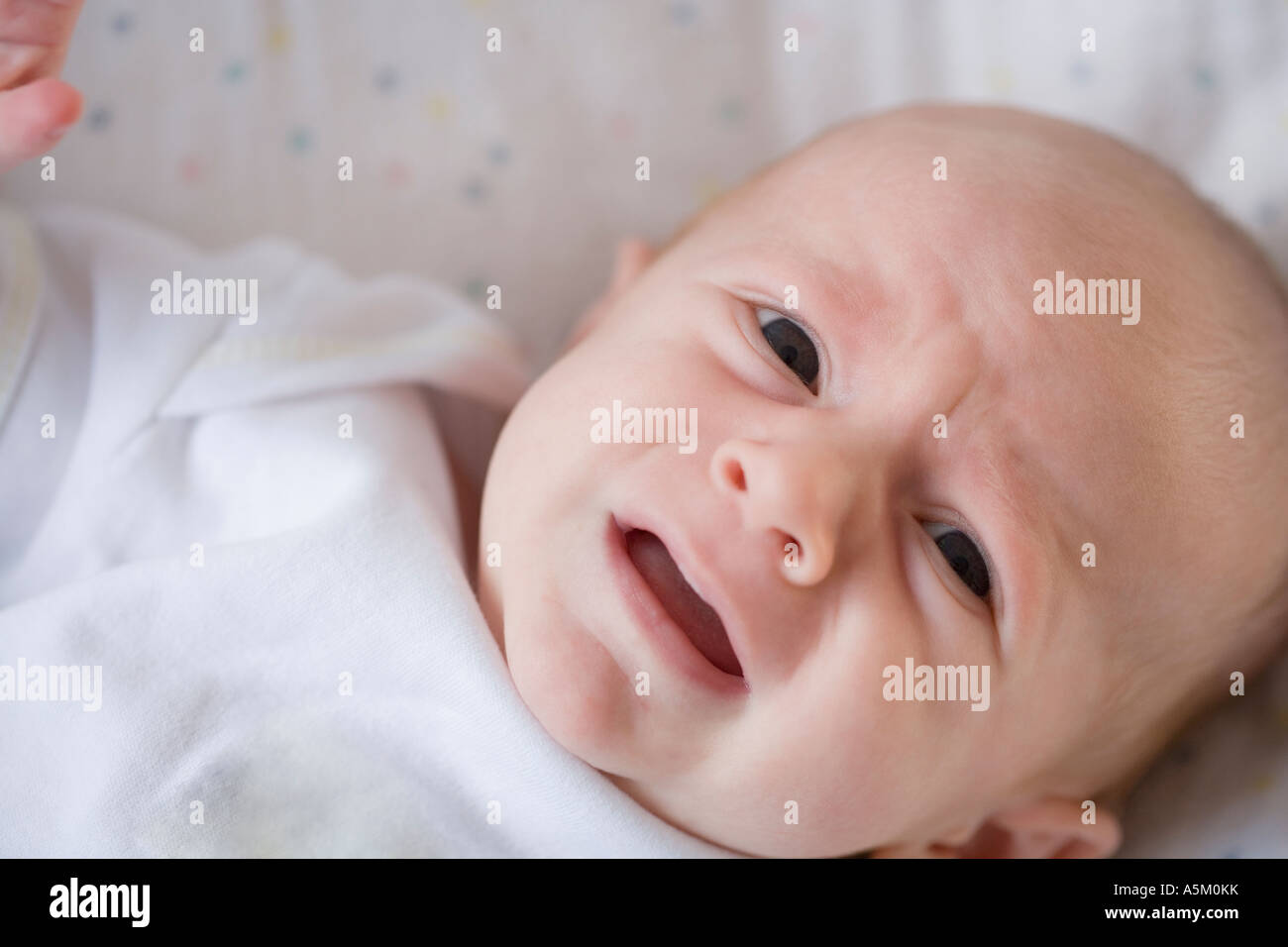 Baby Lying Down Crying High Resolution Stock Photography and Images - Alamy