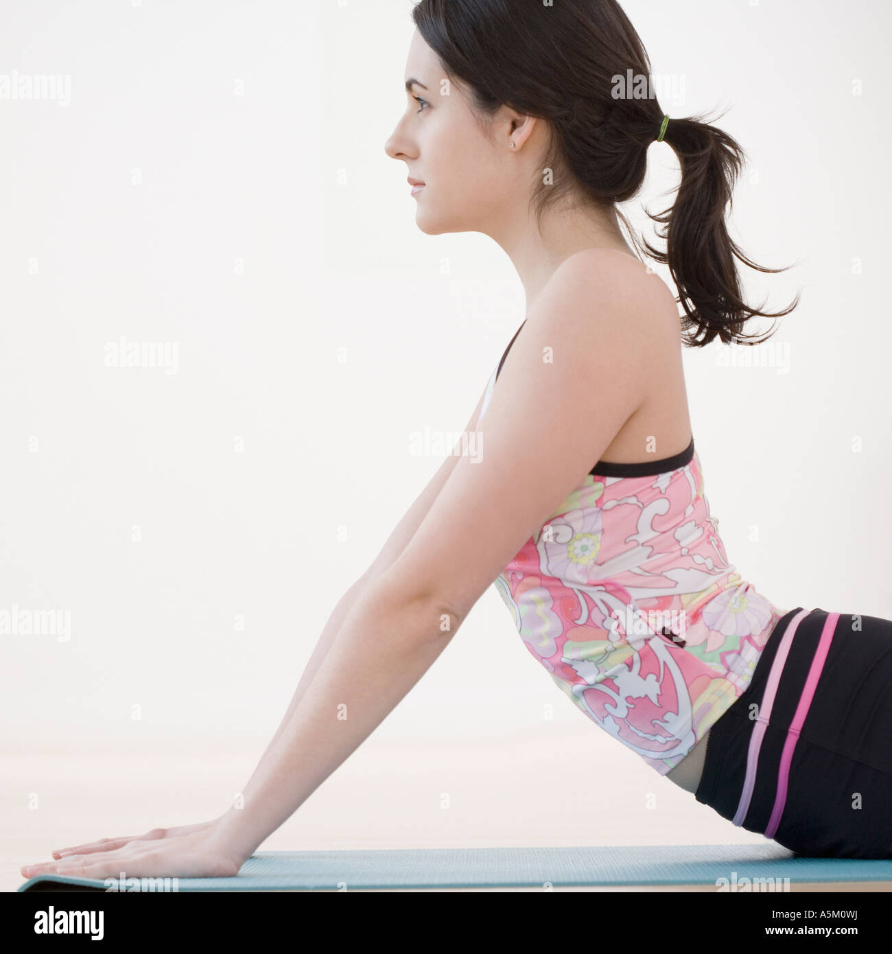 Young people practicing yoga hi-res stock photography and images - Alamy