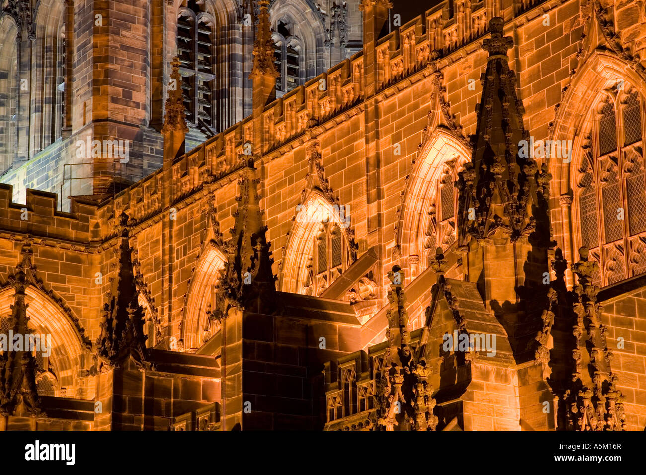 Chester cathedral at night showing bell tower, illuminated by sodium ...