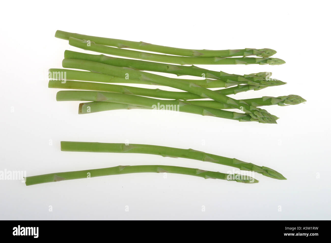 asparagus stalks on a white background Stock Photo - Alamy