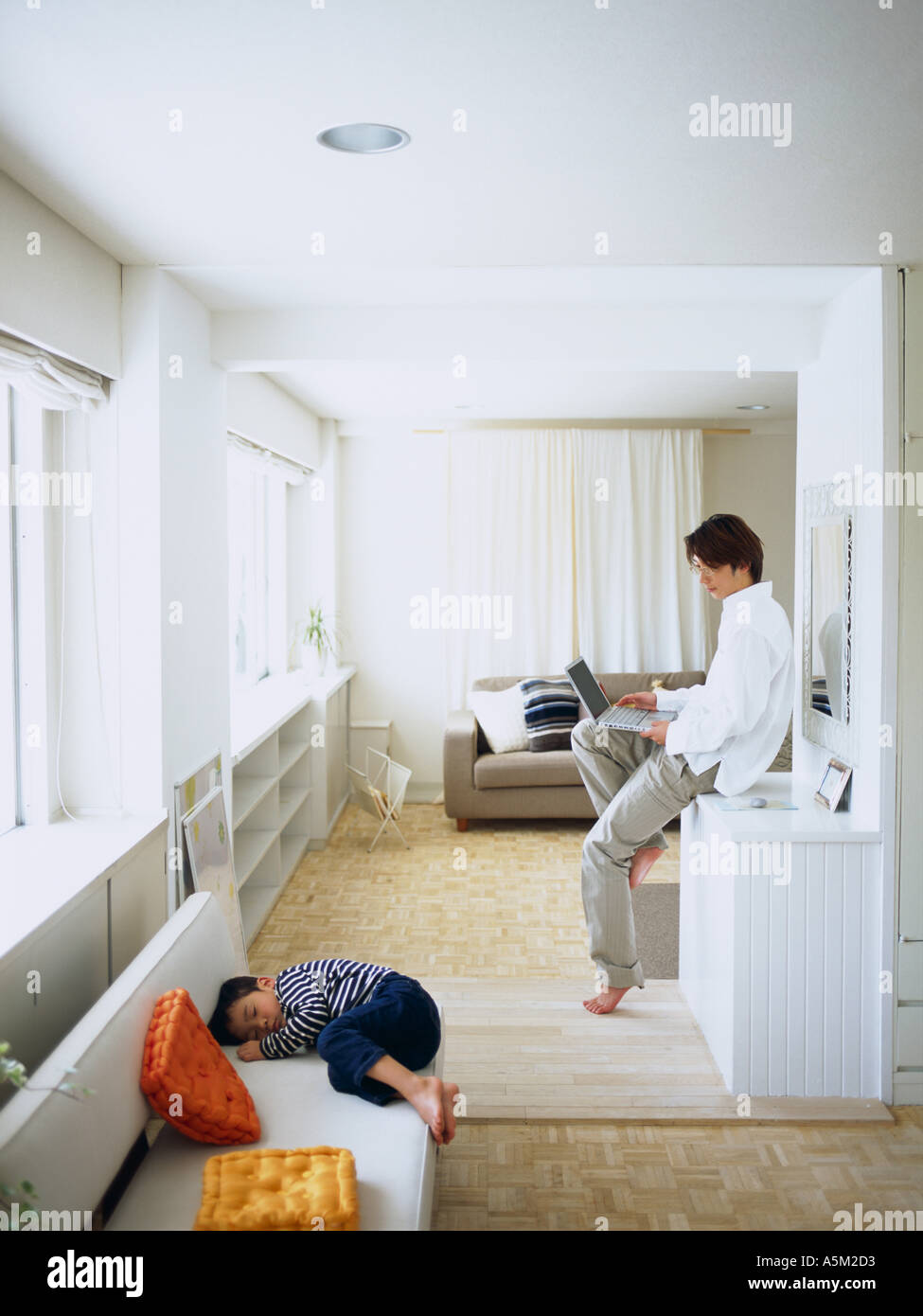 Father watching his son sleep Stock Photo - Alamy