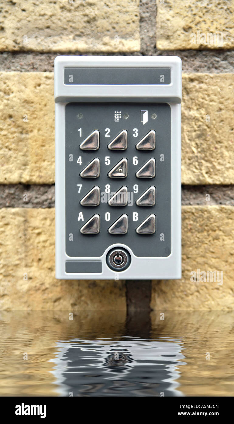 Combination security lock getting flooded Stock Photo - Alamy