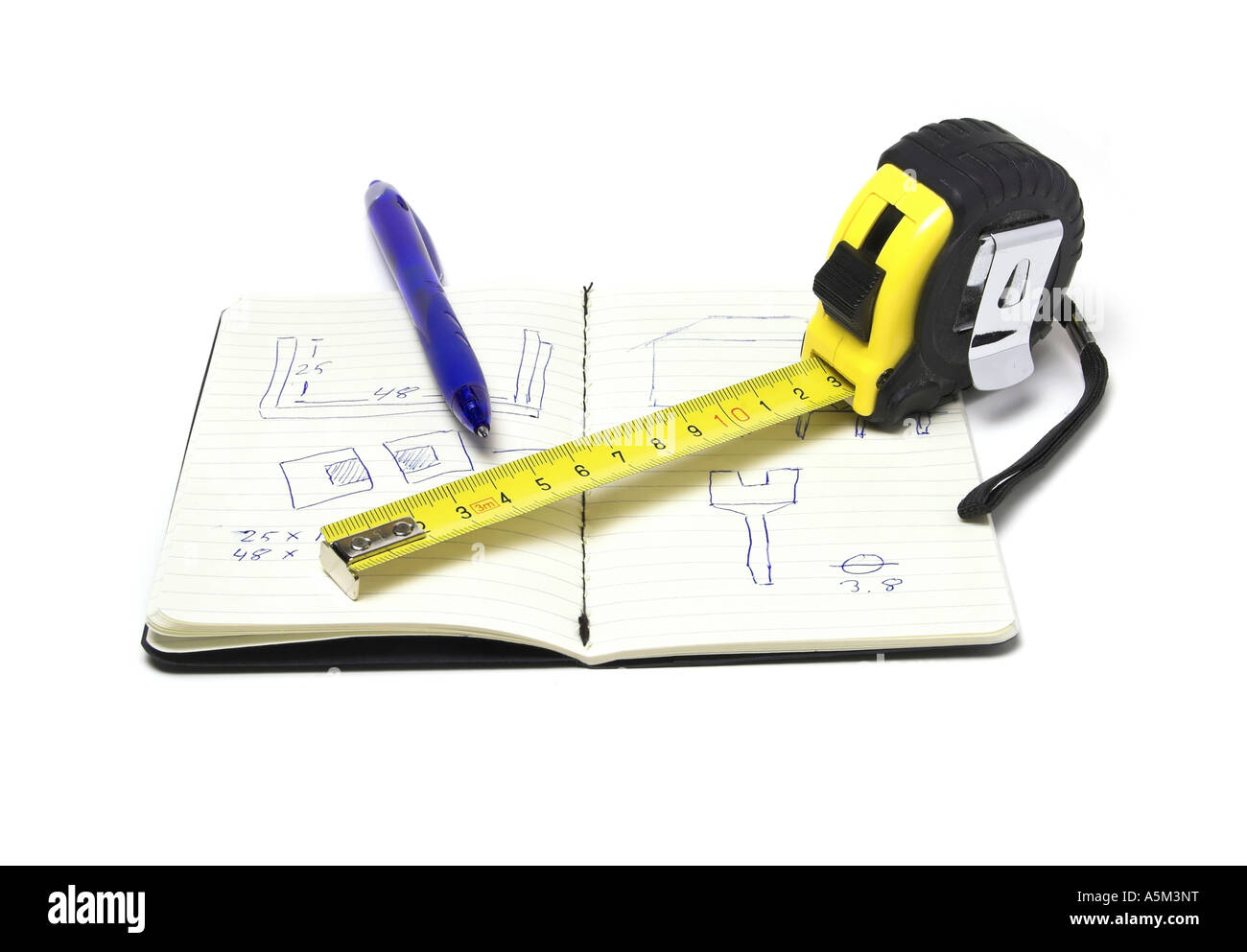Notebook pen and measure tape Stock Photo - Alamy