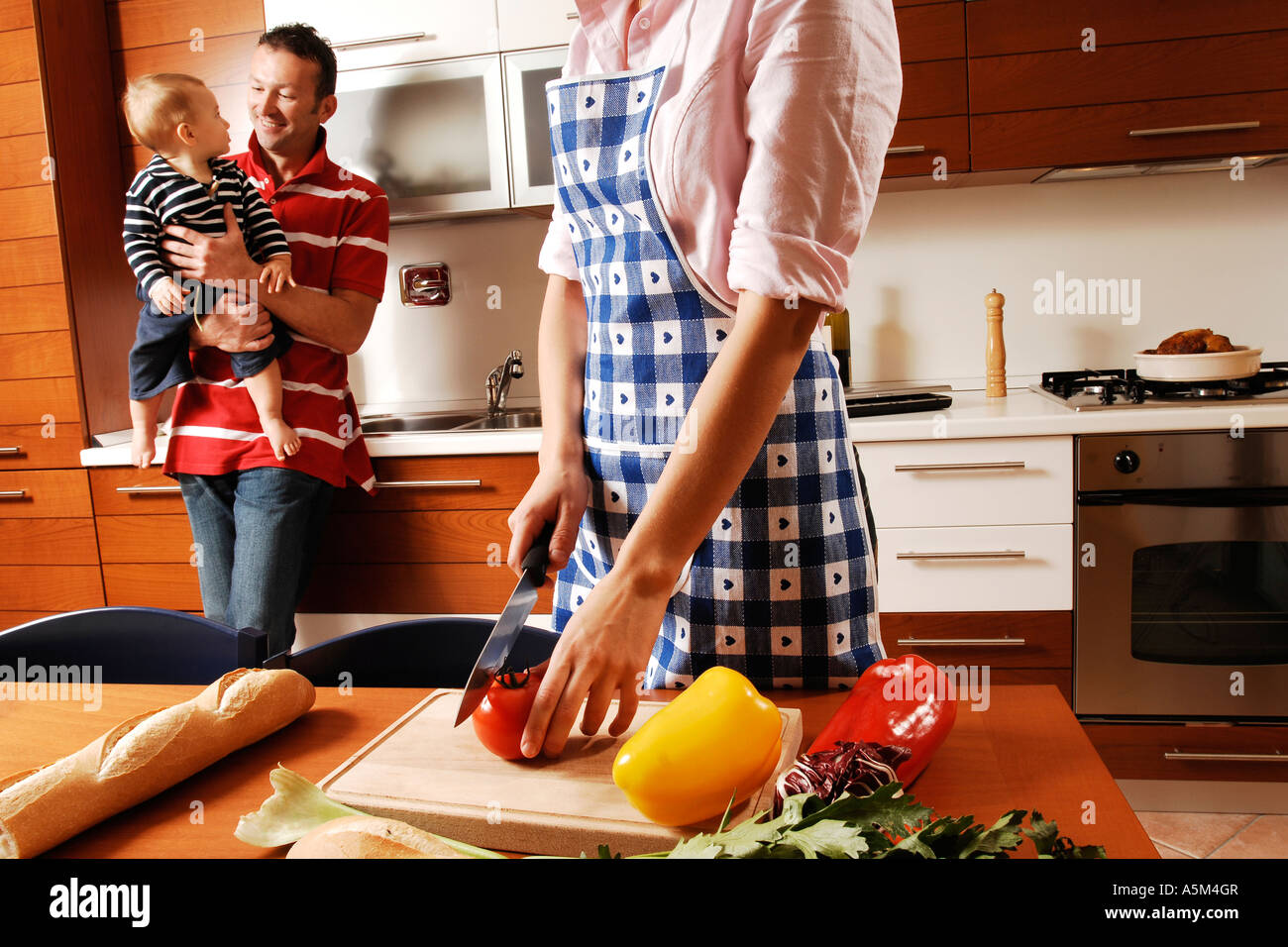 family in the kitchen Stock Photo - Alamy