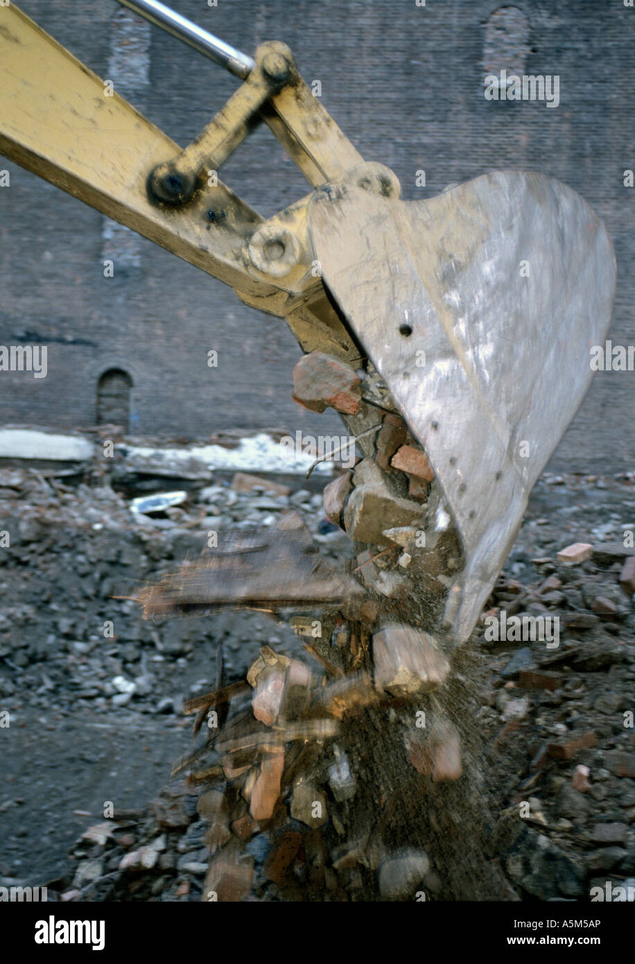 Backhoe clearing lot for Random House building in New York City. Debris ...