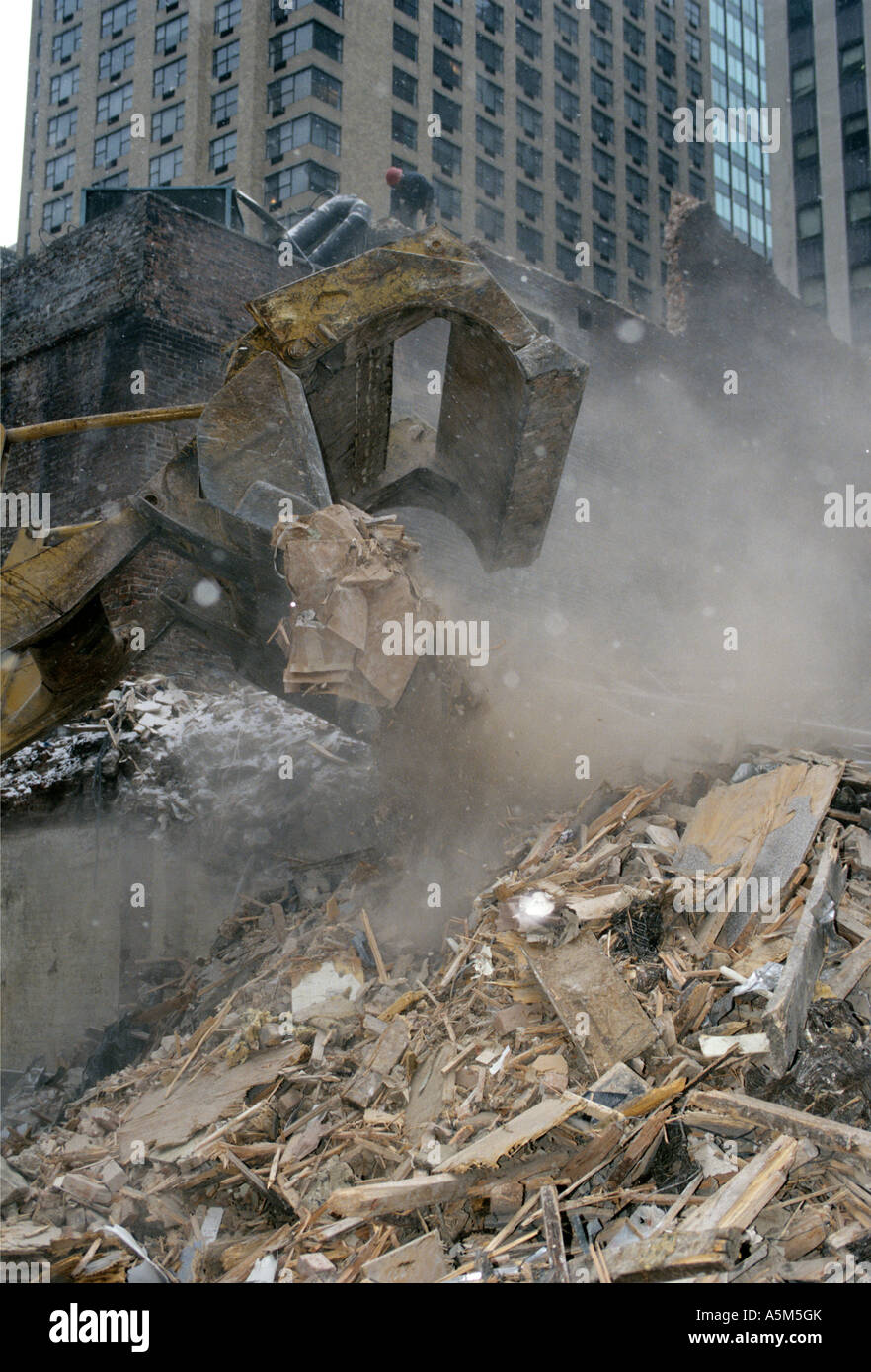 Tearing down existing building to make room in New York City Stock ...