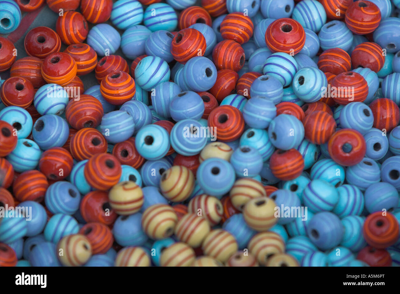 Many coloured beads many Stock Photo - Alamy