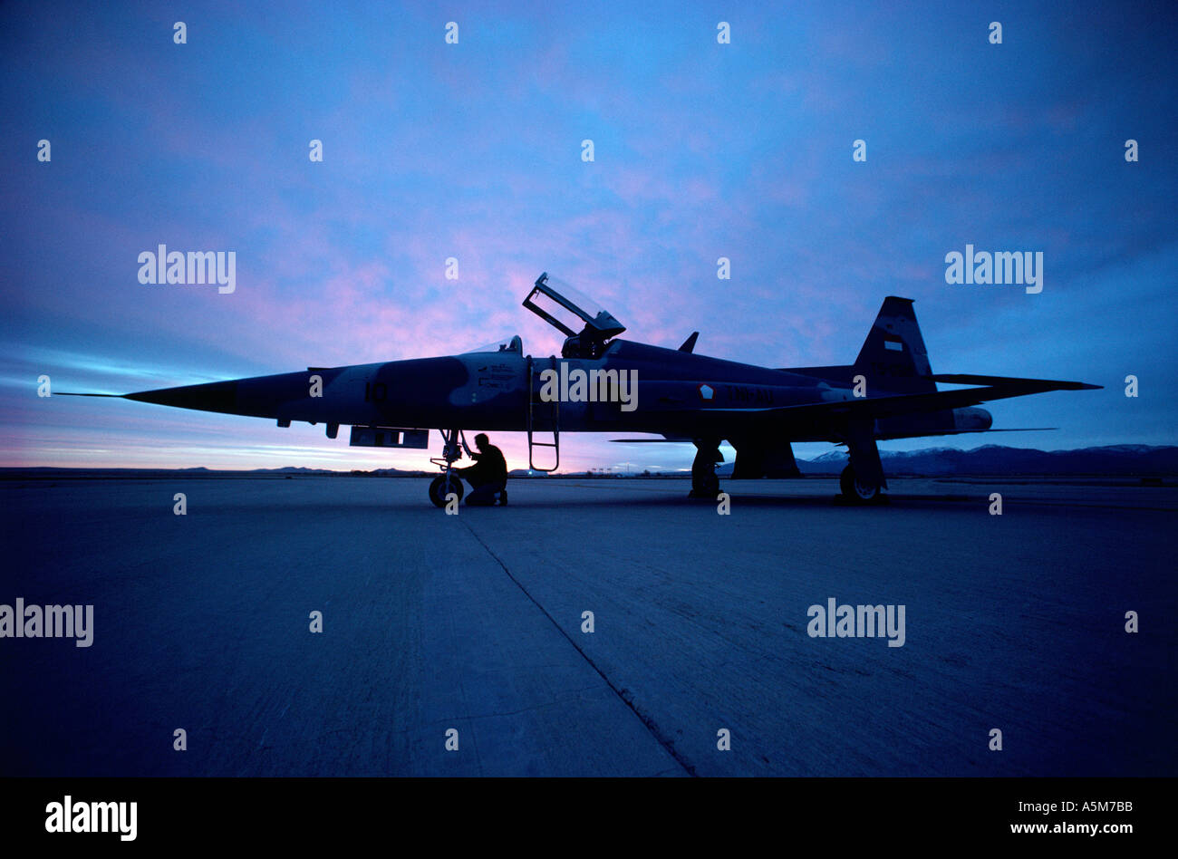 United States Military Fighter Jet at Sunrise Stock Photo - Alamy