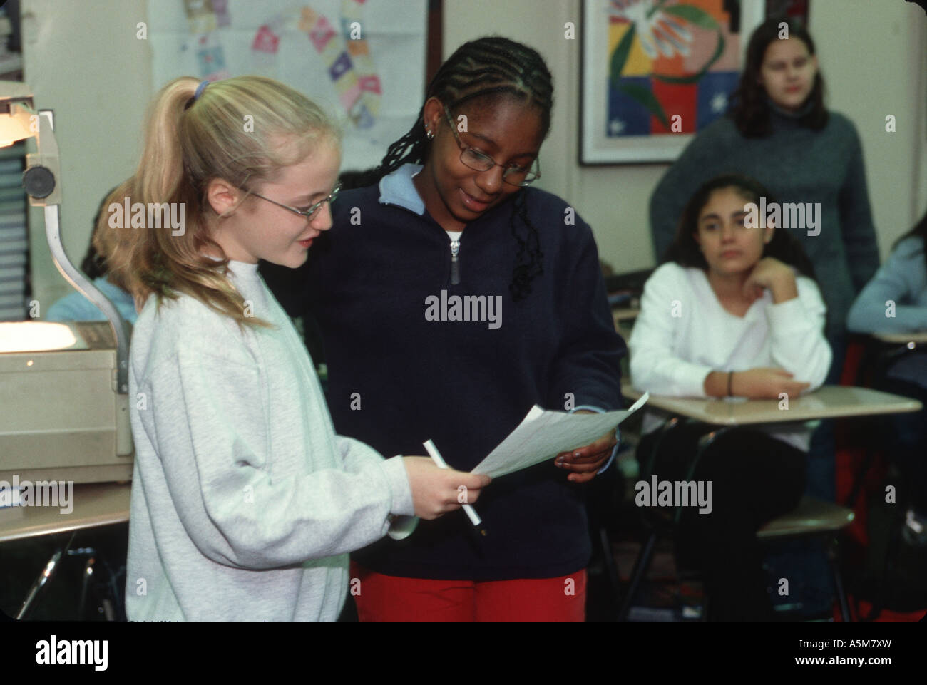 Students reading a dialog in French during French class at a NY City ...