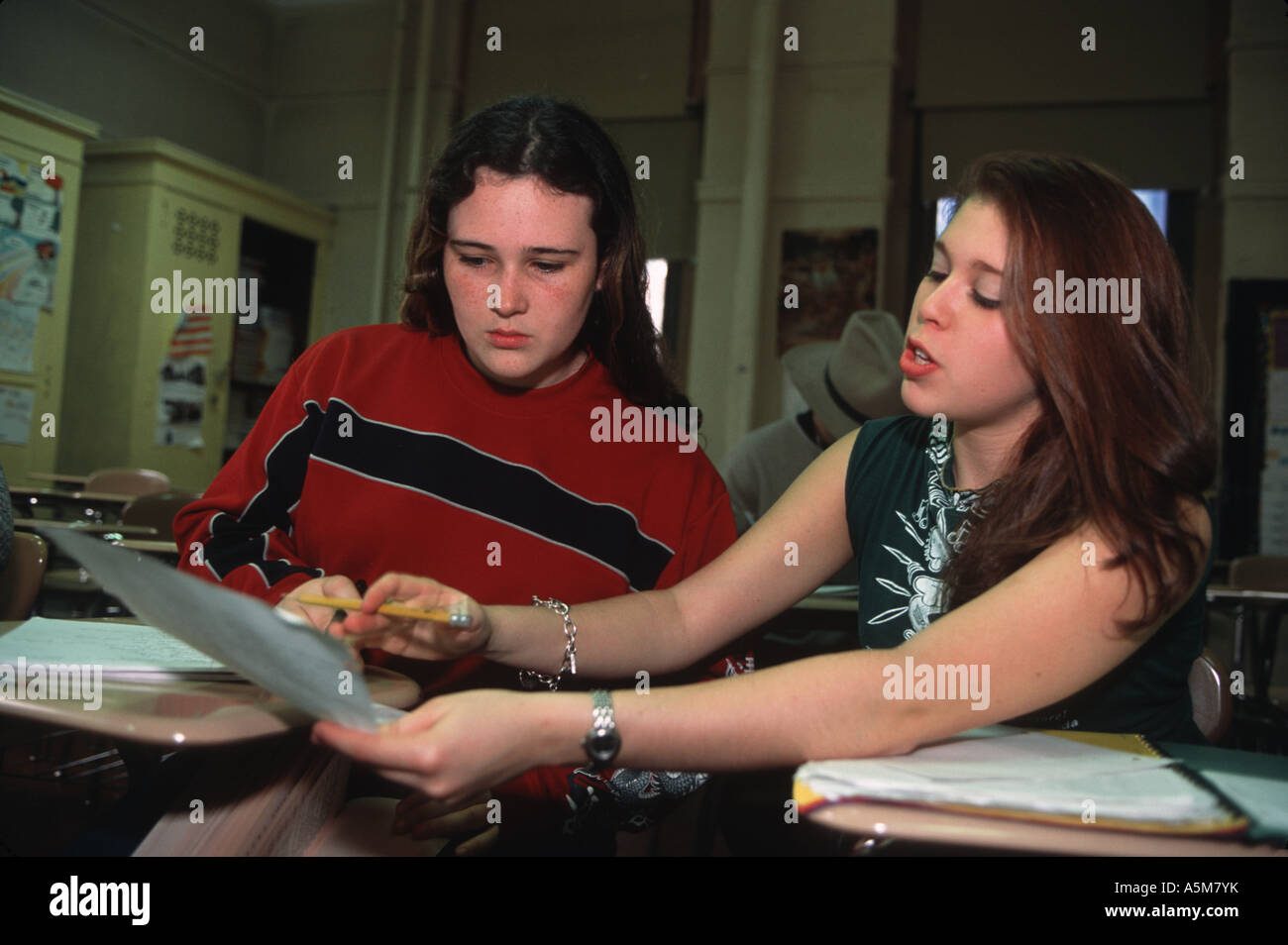 Group teens work together classroom hi-res stock photography and images ...
