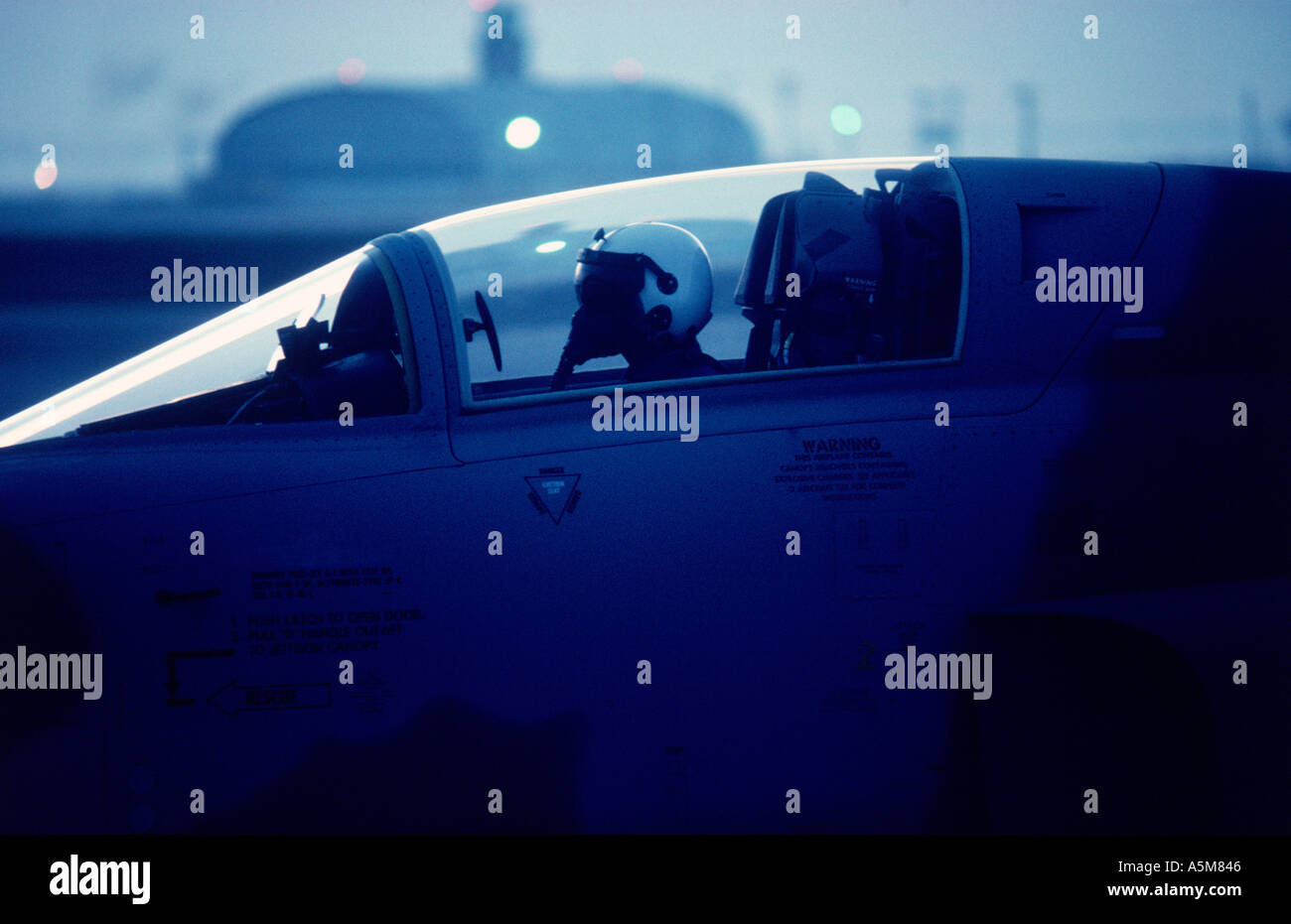 Military fighter jet and pilot prepare for pre dawn takeoff at US ...