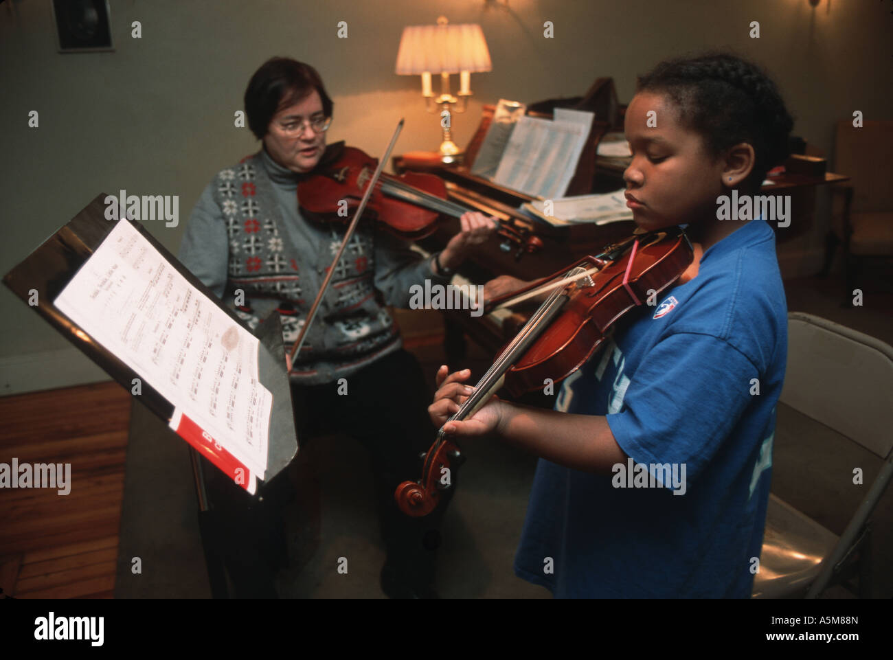 Young student taking a music lesson at the Brooklyn Music School in ...