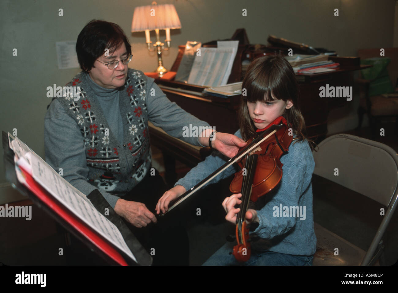 Young student taking a music lesson at the Brooklyn Music School in ...