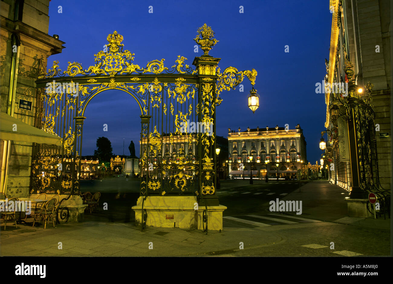GILT WROUGHT-IRON RAILINGS WITH LANTERN PLACE STANISLAS SQUARE AT NIGHT ...