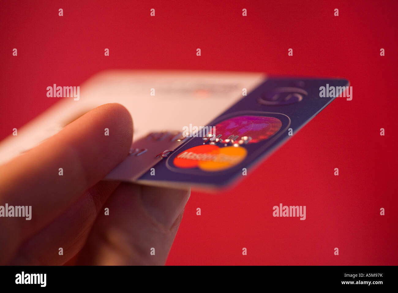 Hand holding credit card Stock Photo - Alamy