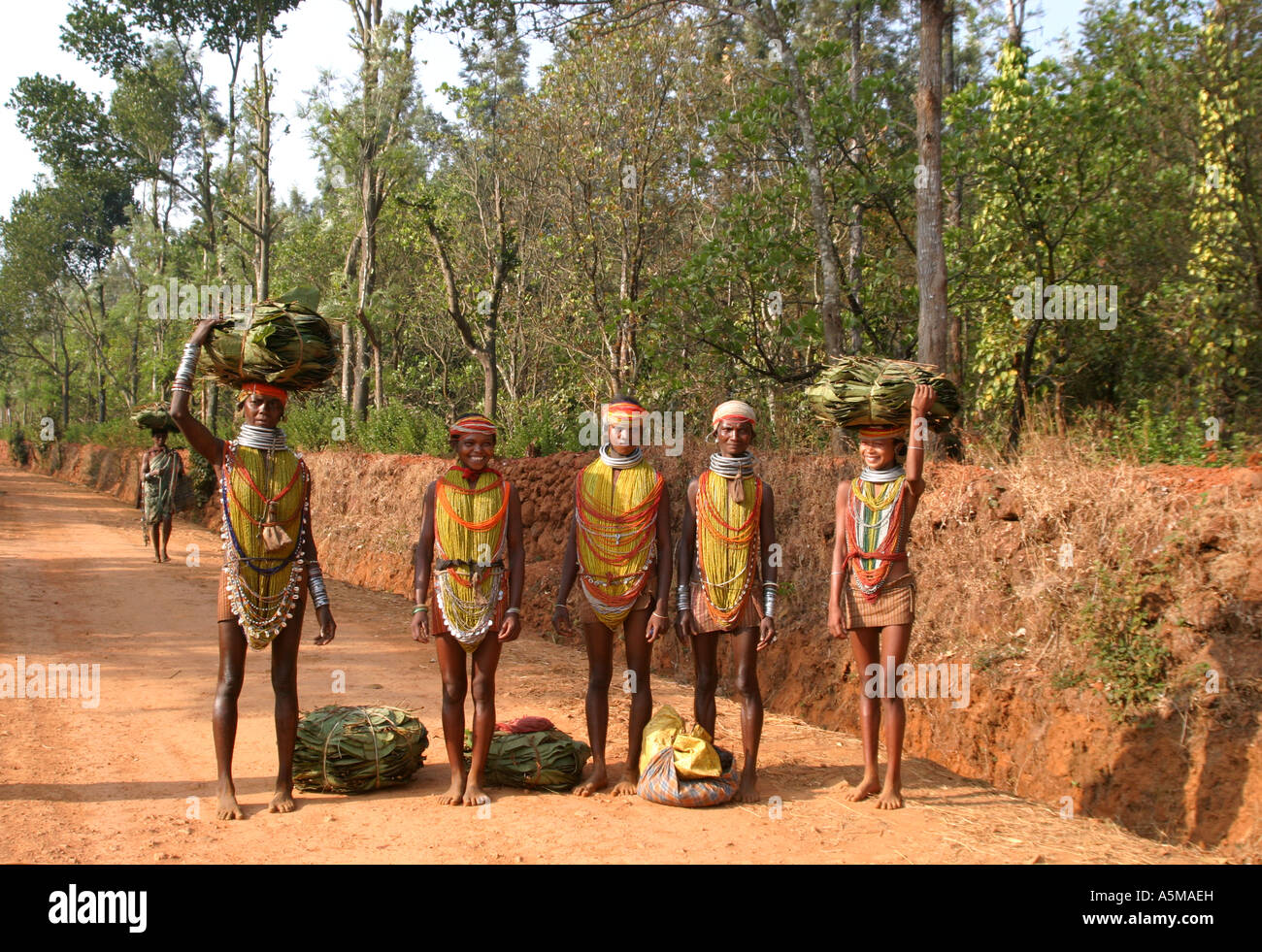 primitive Bondo (Bonda) tribal women wearing little more than bead ...