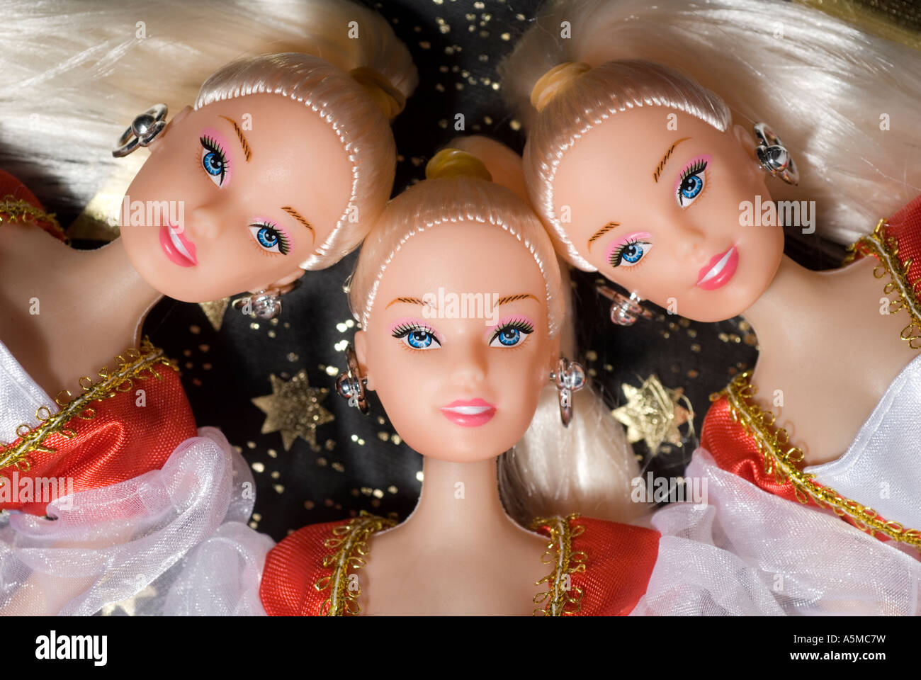 Identical triplets hi-res stock photography and images - Alamy