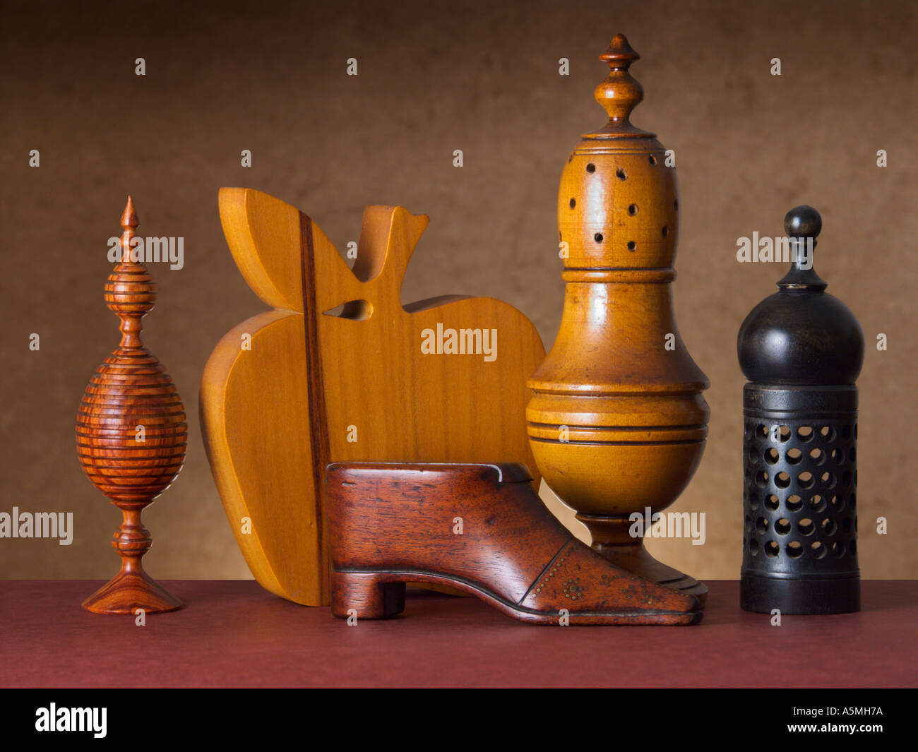 Carved and turned wooden antique objects Stock Photo - Alamy