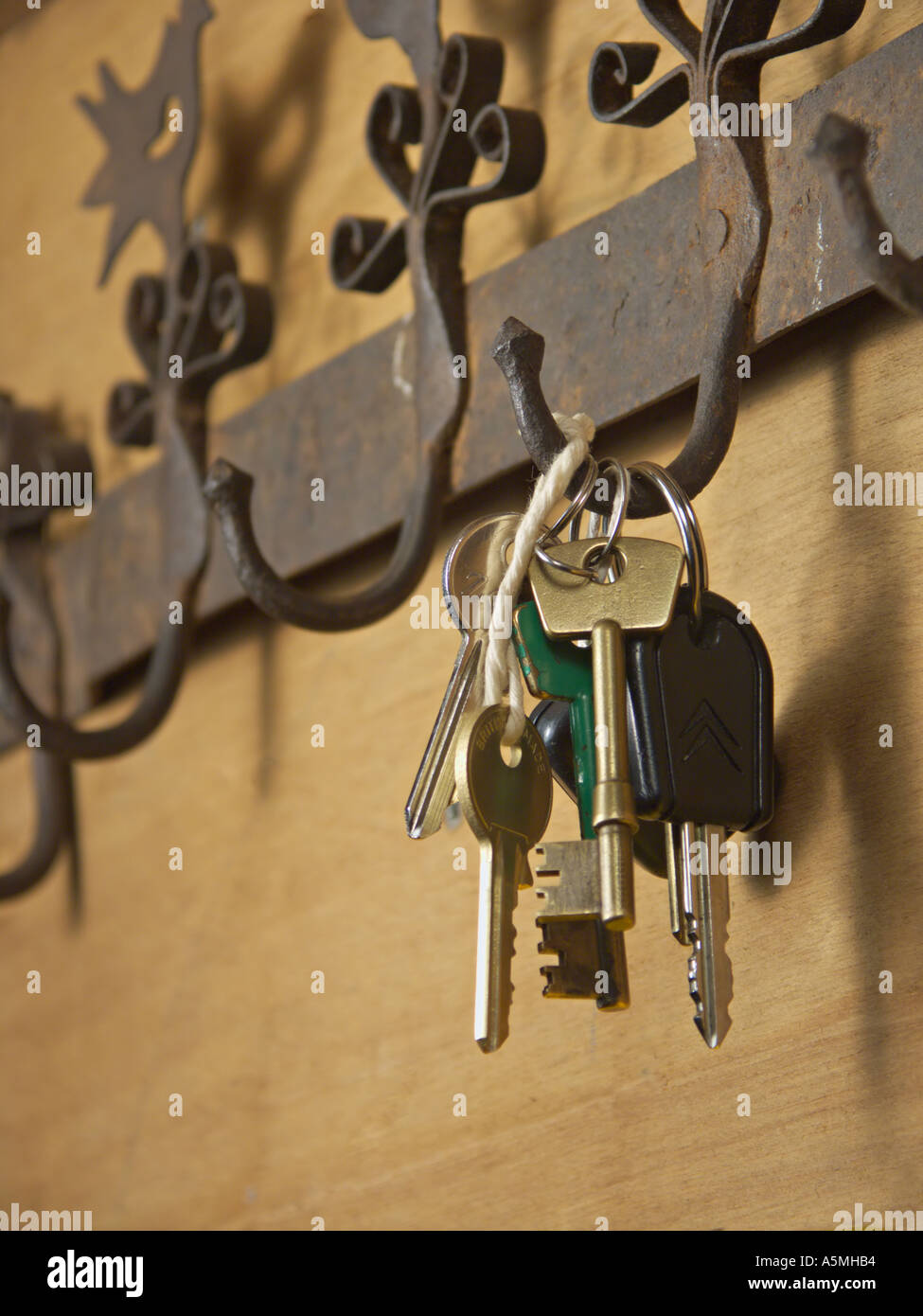 Keys hanging on a rack Stock Photo - Alamy