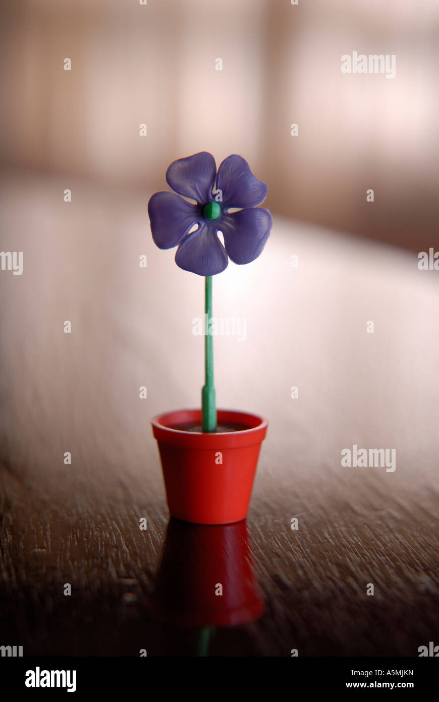 Miniature plastic Flower Stock Photo - Alamy