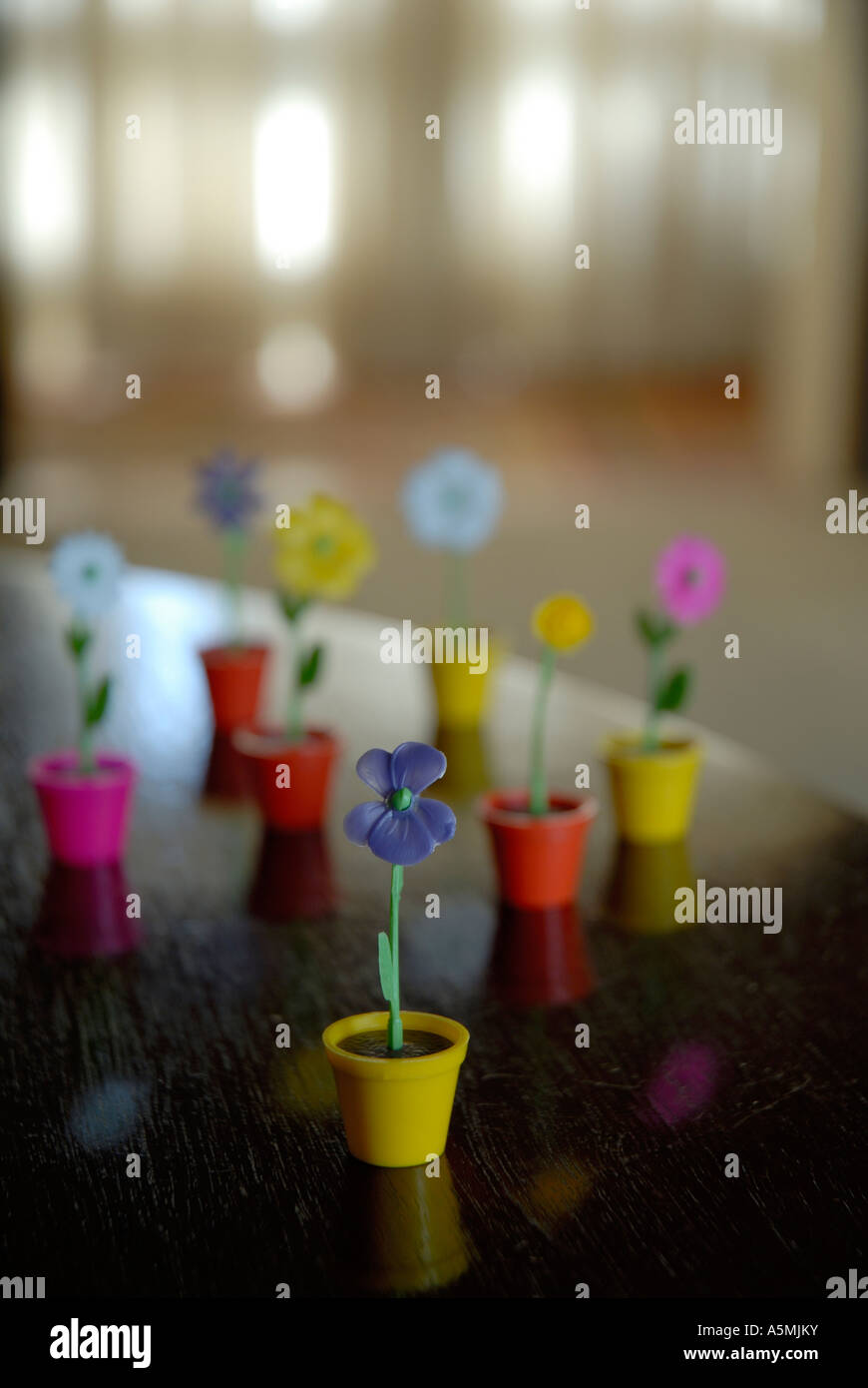 Miniature plastic Flowers Stock Photo - Alamy