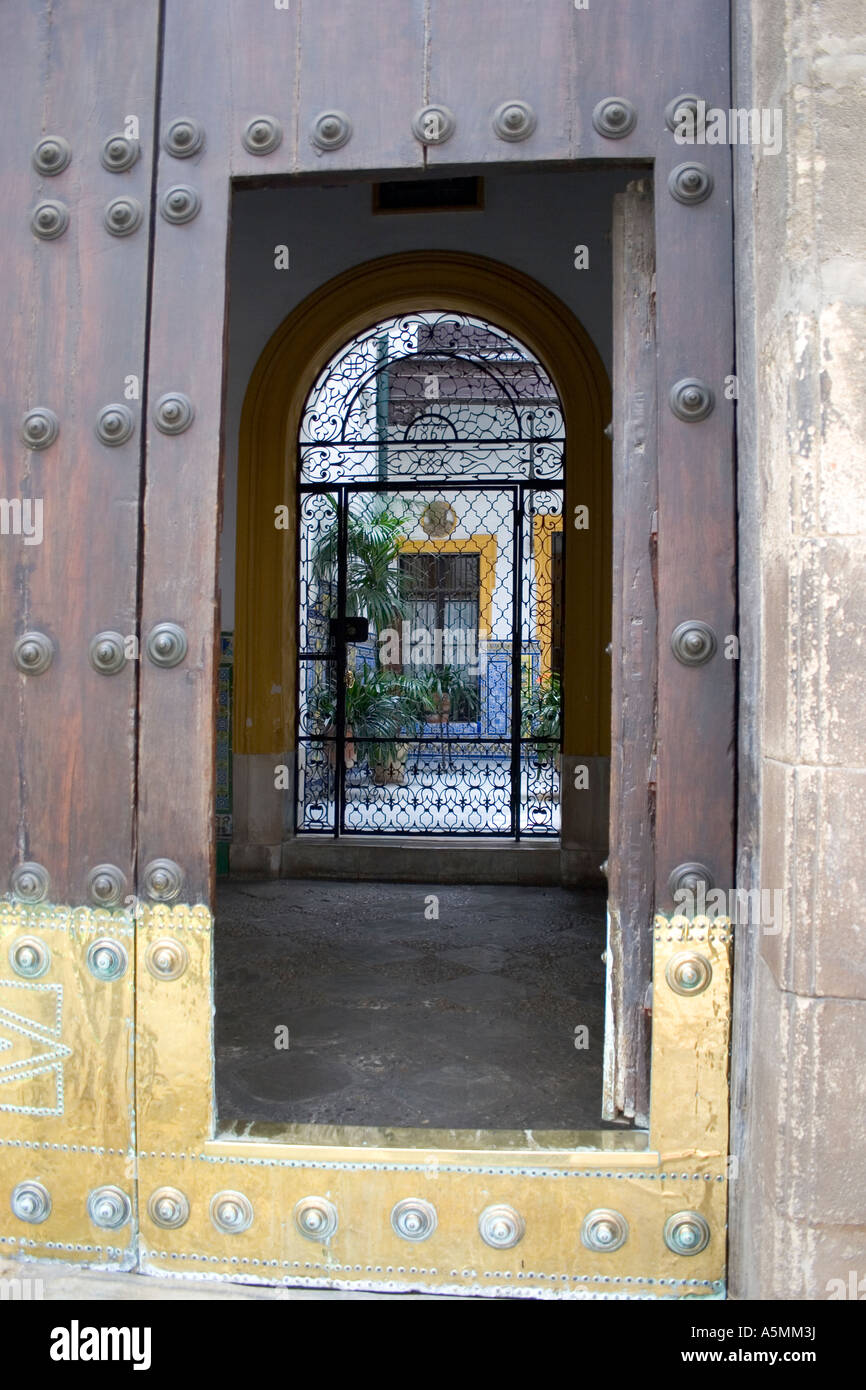 A Spanish ally and garden in Seville Stock Photo - Alamy