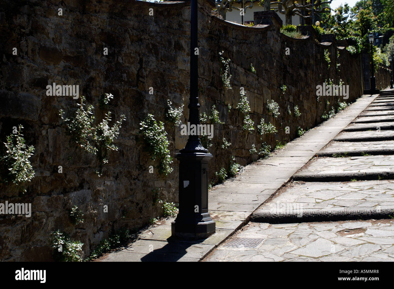 Uphill street in Florence Stock Photo - Alamy