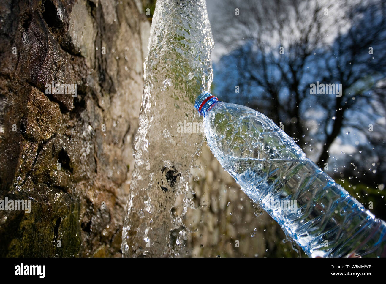 Filling water bottle from spring hi-res stock photography and images ...
