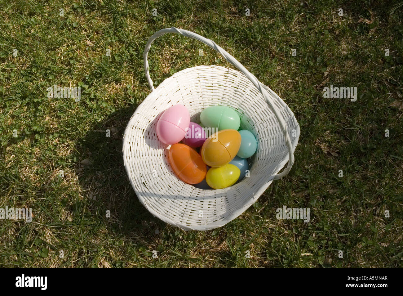 Easter basket filled plastic eggs hi-res stock photography and images ...