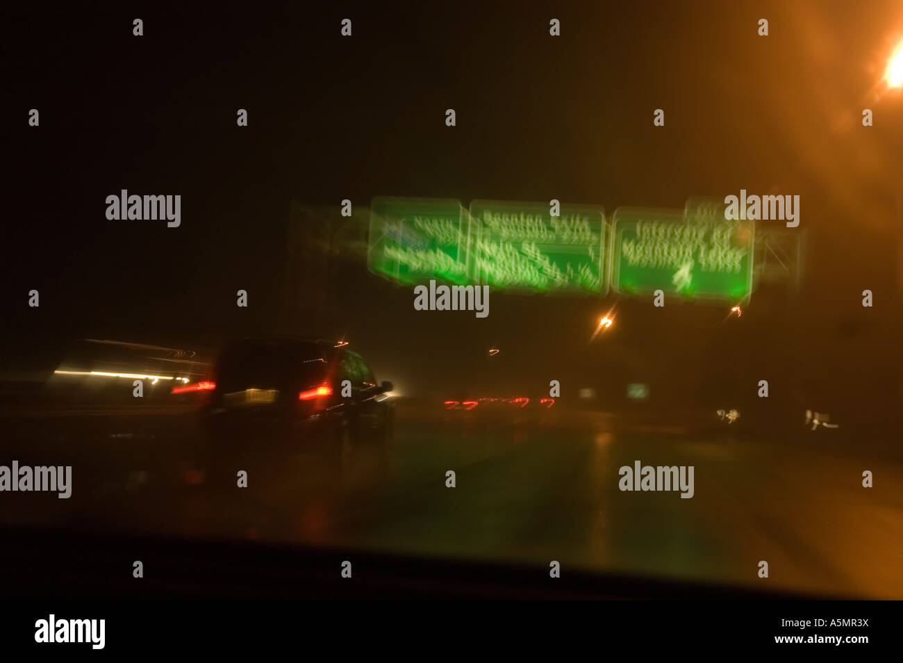 overhead exit signs on a rainy interstate 287 Morris County New Jersey ...