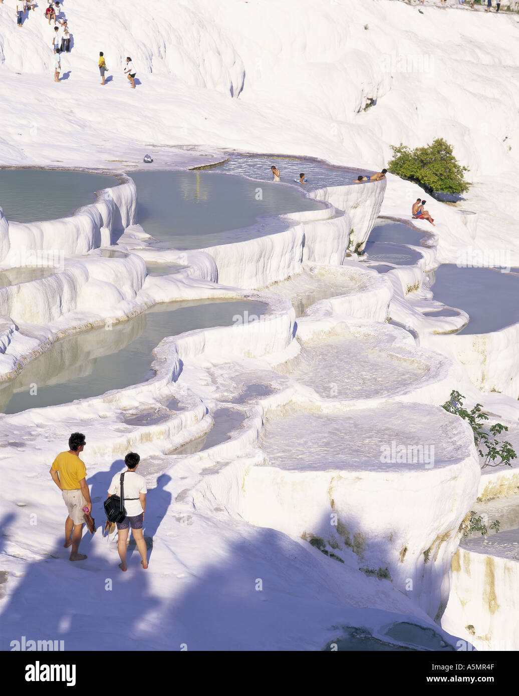 People bathing in calcite terrace pools at Pammukale Turkey Stock Photo ...