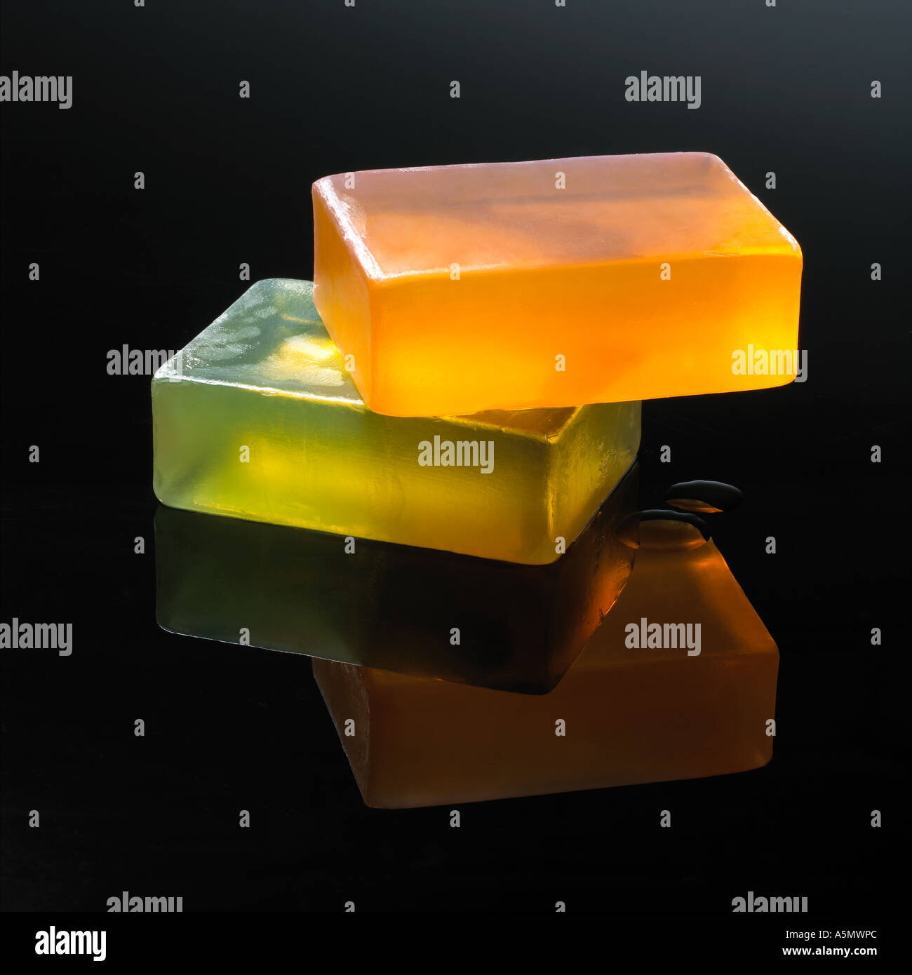 Coloured soap on black background Stock Photo - Alamy