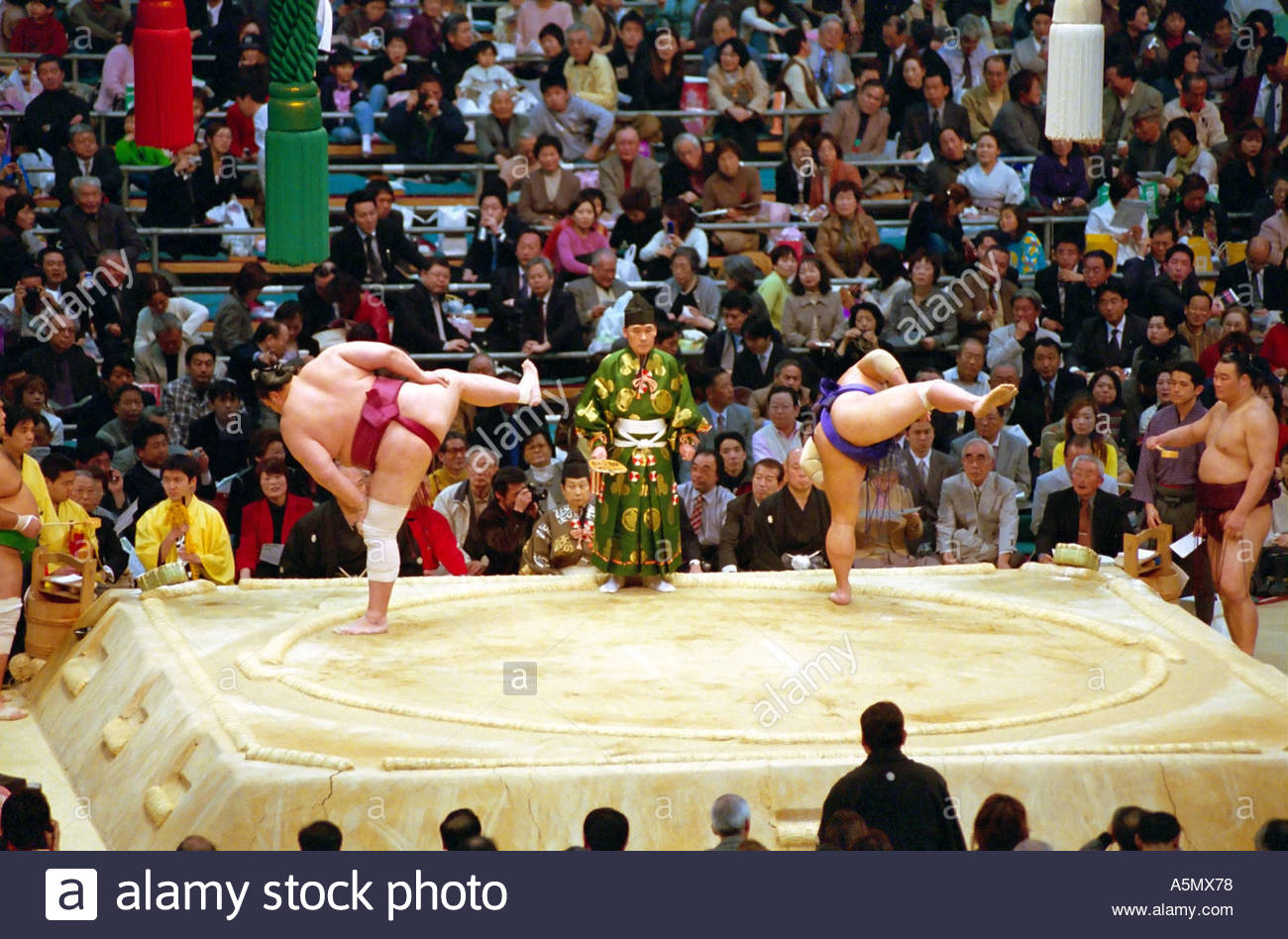 Sumo wrestlers warm up in a pre match ritual at the sumo basho Stock ...