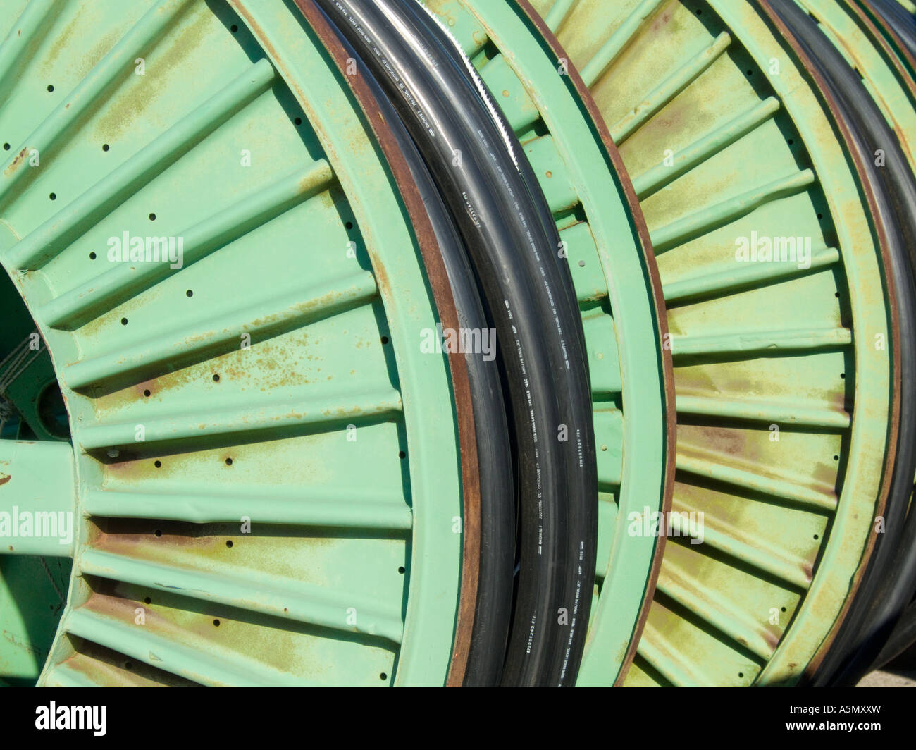 metal spools of wire in the yard of a electric power company utility ...