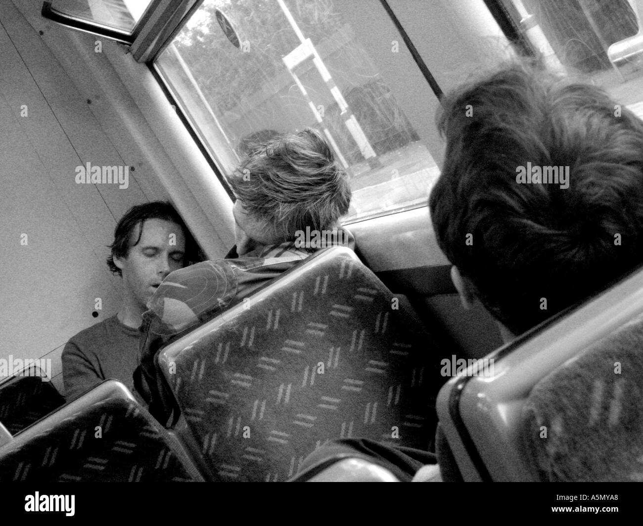 Sleeping commuters hi-res stock photography and images - Alamy